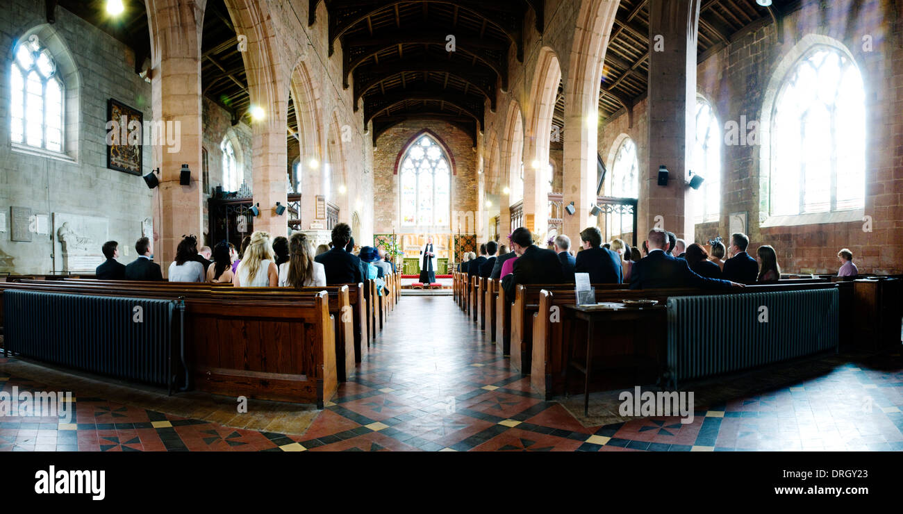 A vicar conducts an English wedding in a church Stock Photo - Alamy