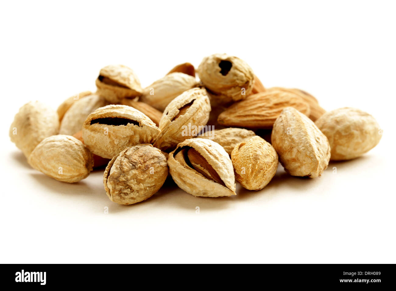 pile of peeled and inshell almonds - delicious and healthy nuts Stock ...