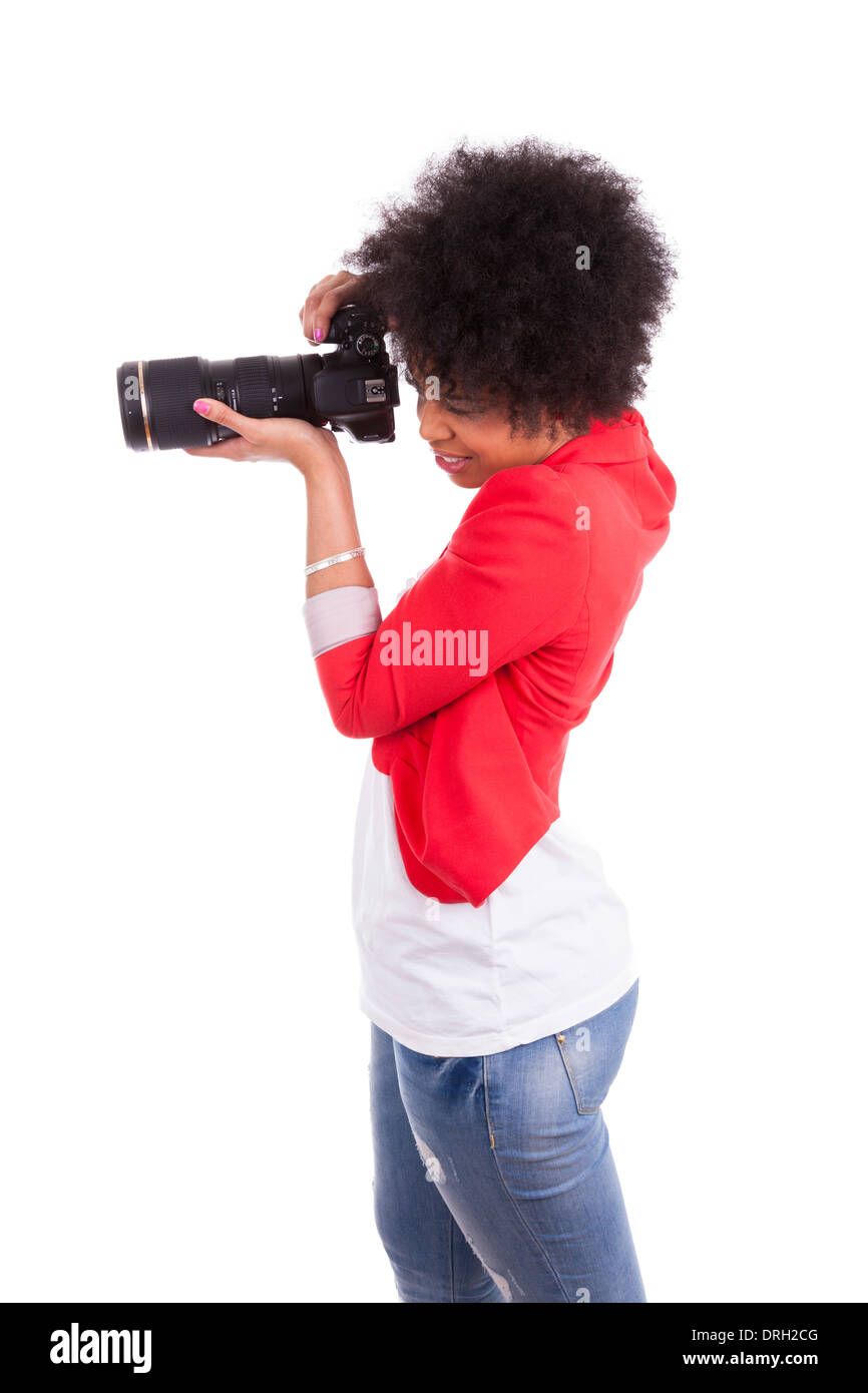 Young african american photographer taking a picture - Black people ...
