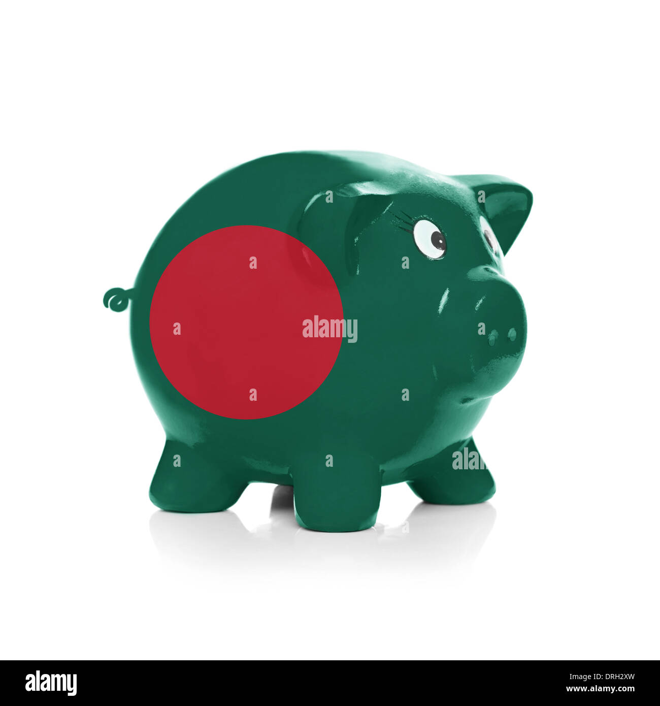 Green piggy bank with dollars sticking out - isolated on white ...