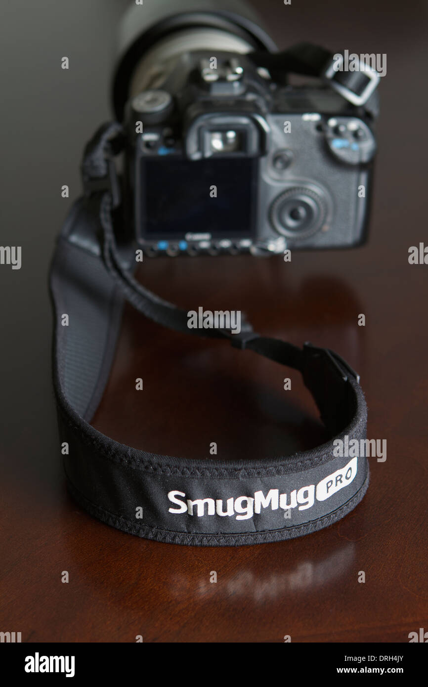 SmugMug pro photo sharing camera strap and canon camera Stock Photo - Alamy