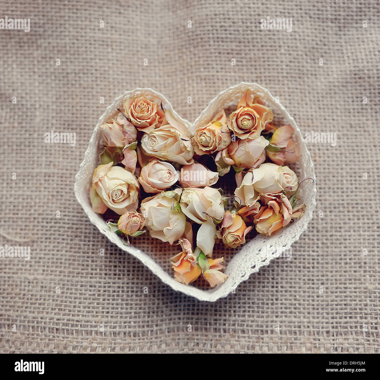 small buds on the fabric dried pink roses and ribbon-floral heart ...