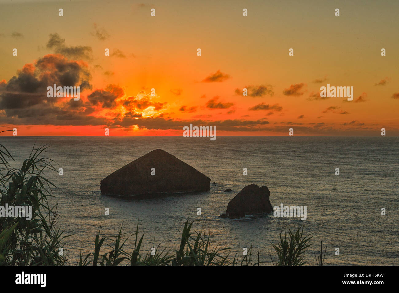 Sunset over volcanic remains, Mosteiros, Sao Miguel Island in the ...