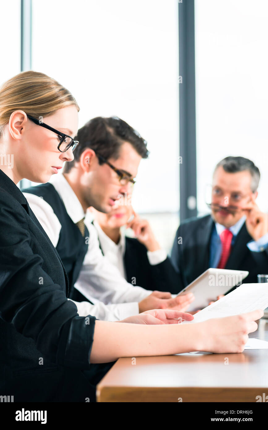 Business - meeting in office, the businesspeople with boss and team are ...