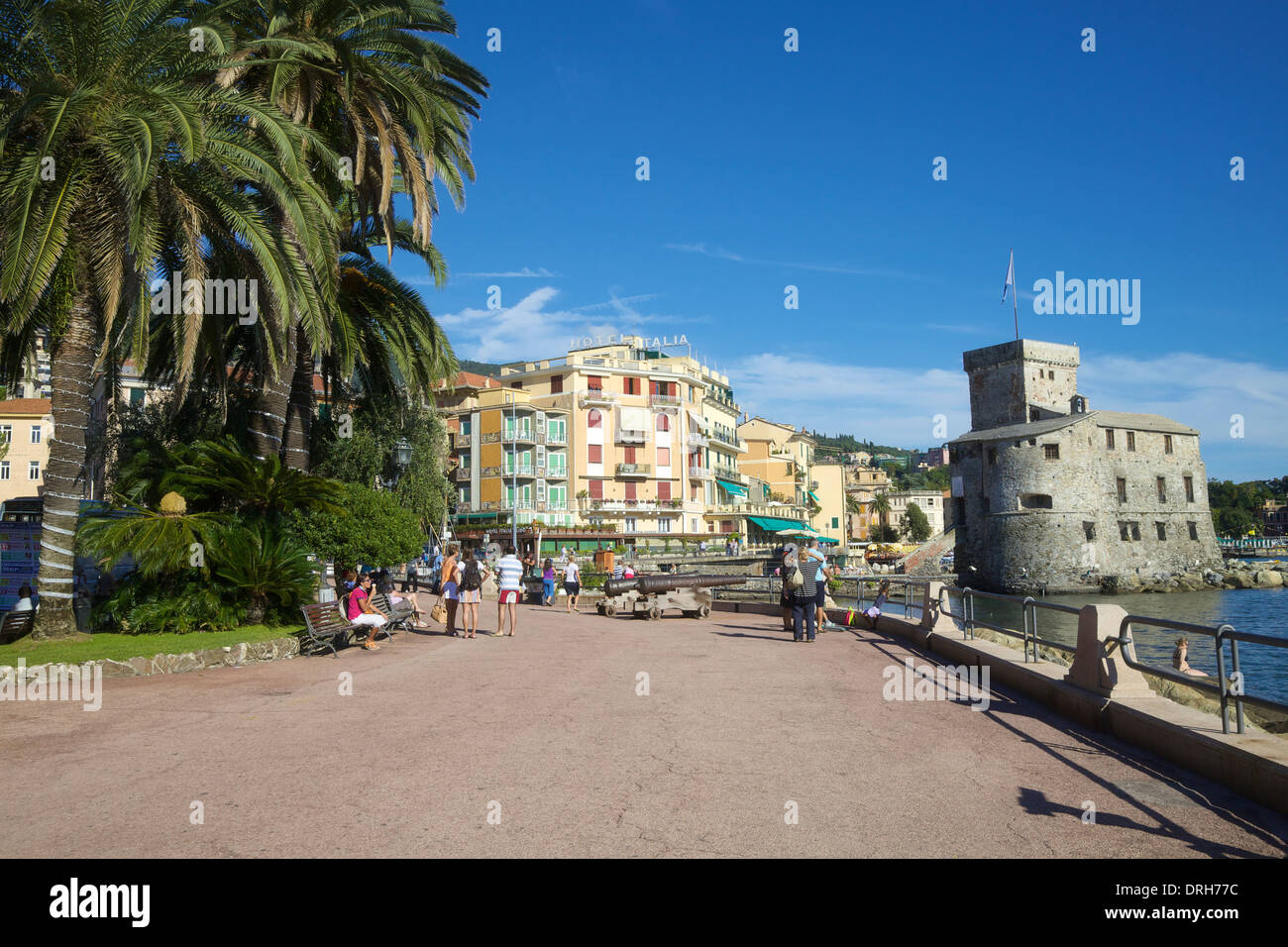 Waterfront path and Castello sur Mare in the harbour of Rapallo, Genoa ...