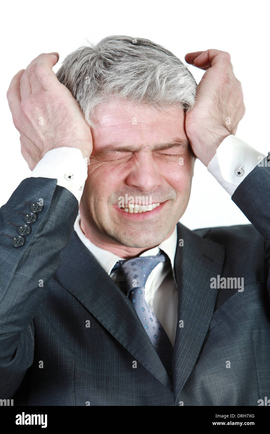 Businessman having head pain working hi-res stock photography and ...