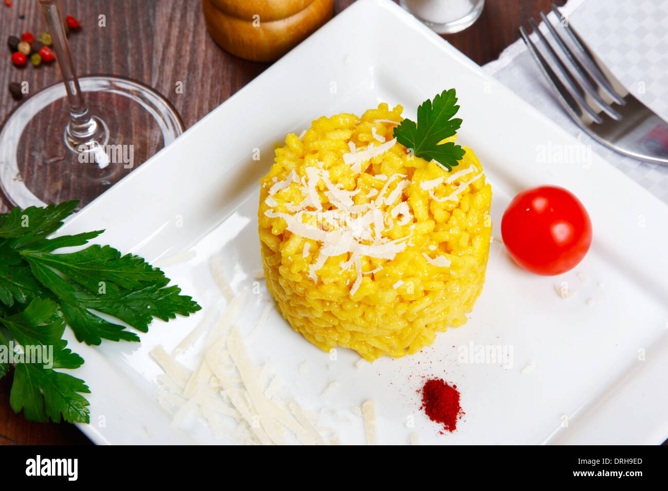 risotto with saffron on a dish Stock Photo - Alamy