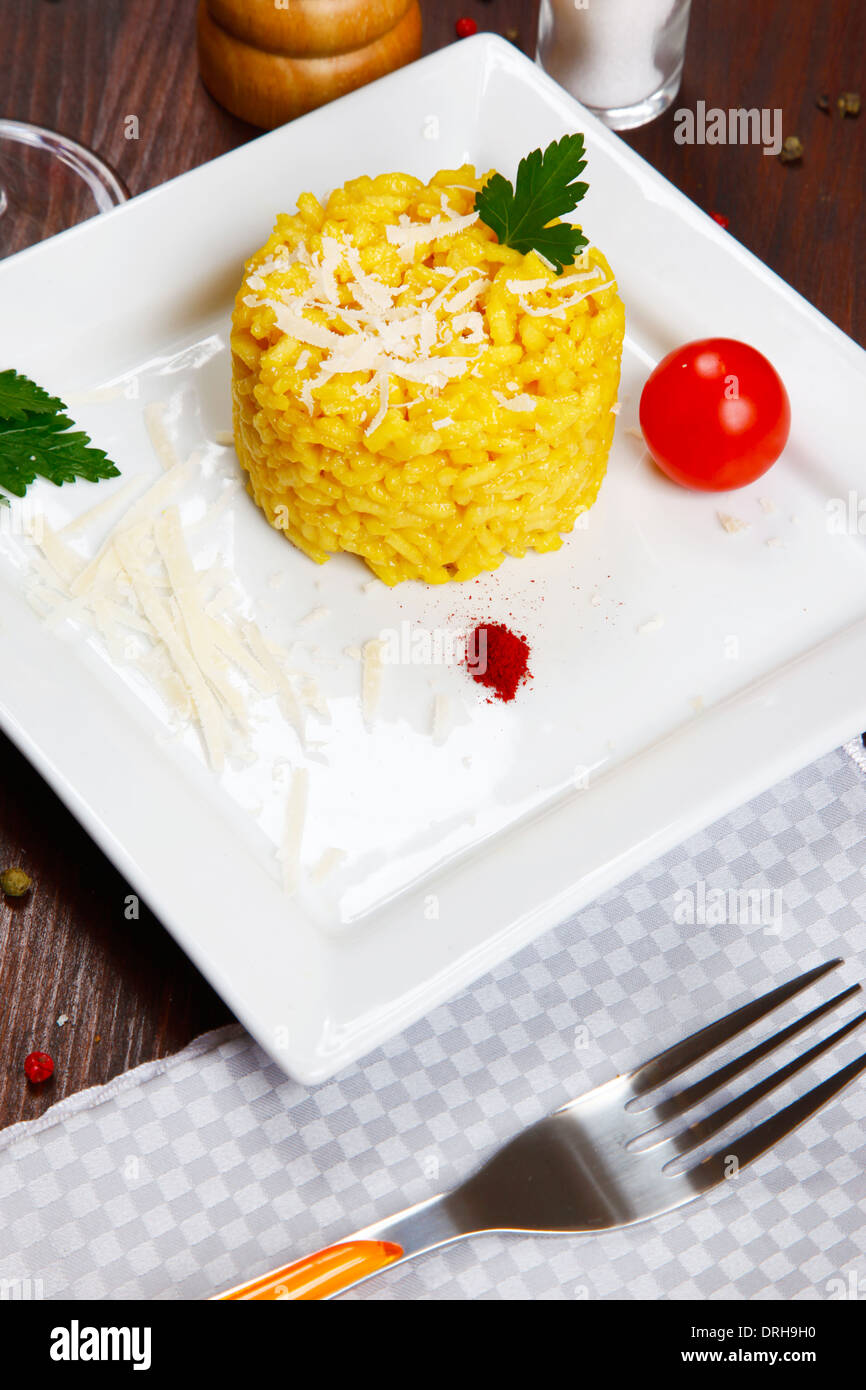 risotto with saffron on a dish Stock Photo - Alamy