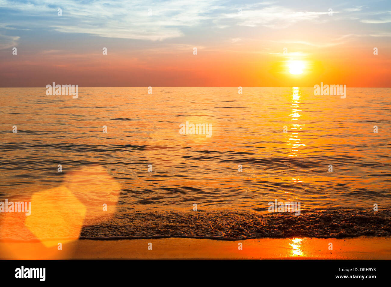 Beautiful sunset over ocean hi-res stock photography and images - Alamy
