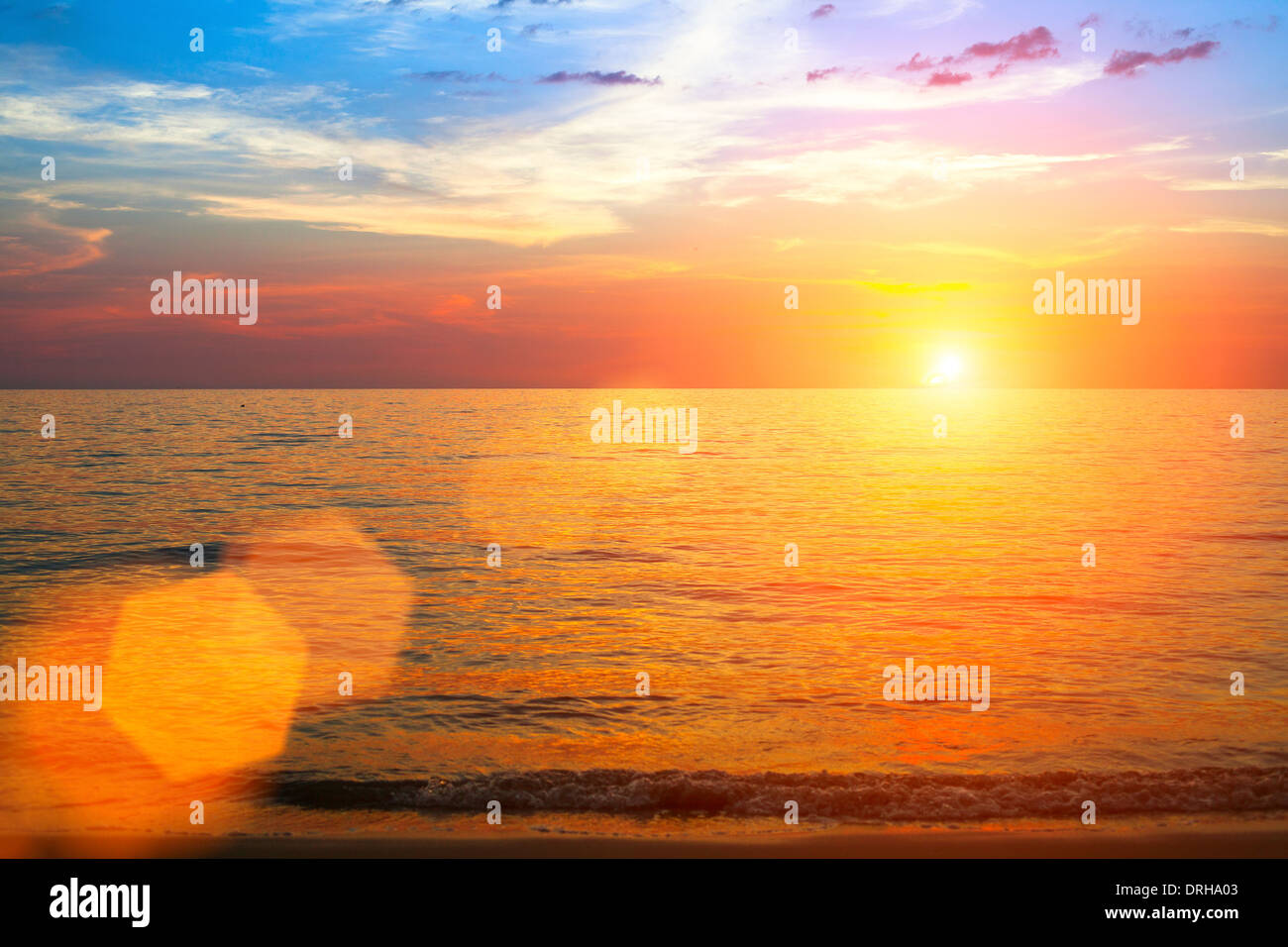 Beautiful sunset over ocean Stock Photo - Alamy