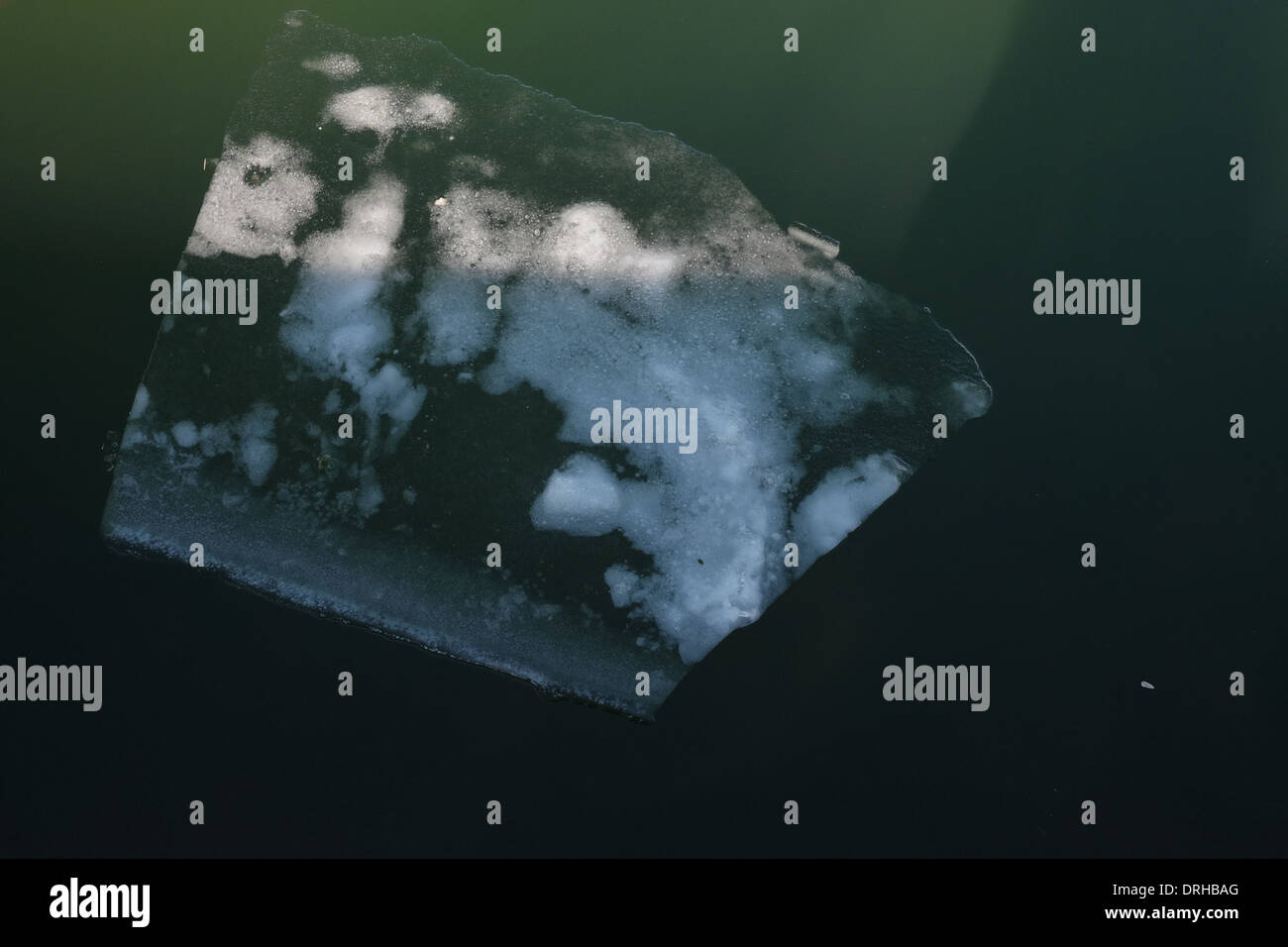 Floating ice on water Stock Photo - Alamy