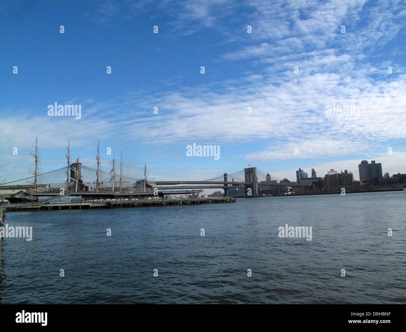South Street Seaport with Brooklyn Bridge in the background, New York ...