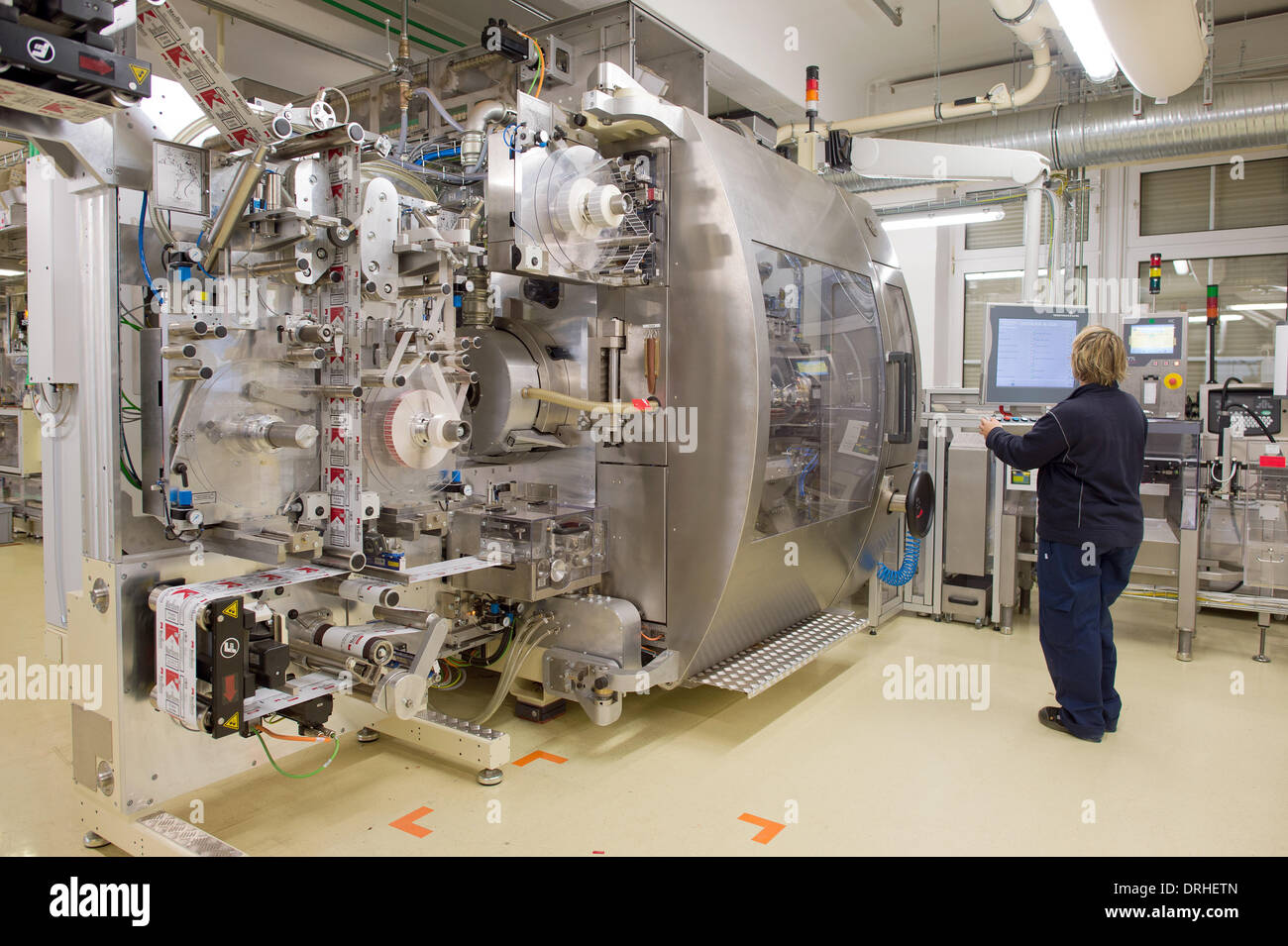 An employee works in the tobacco processing department of the f6 ...