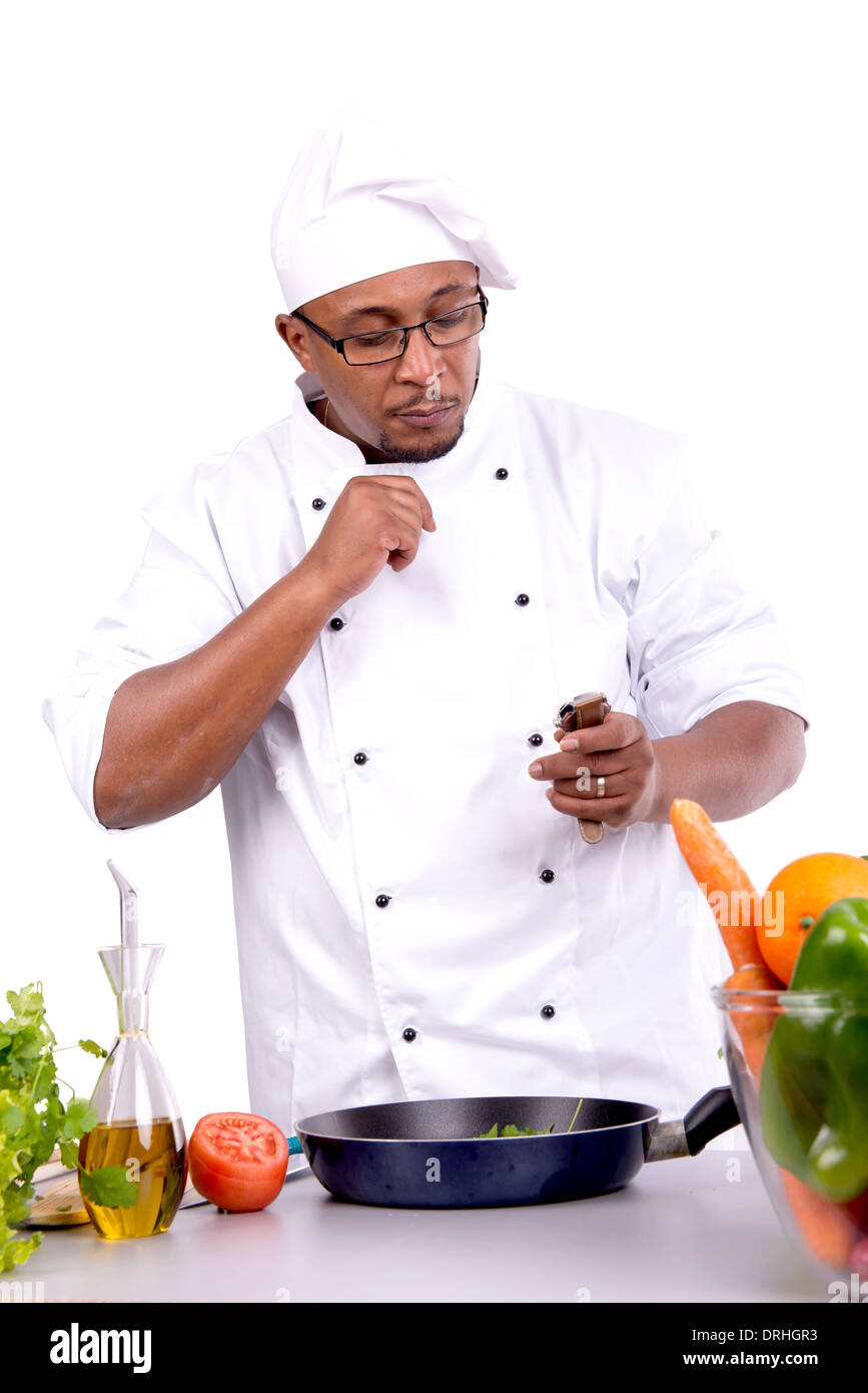 Male chef looking at the time, cooking Stock Photo - Alamy
