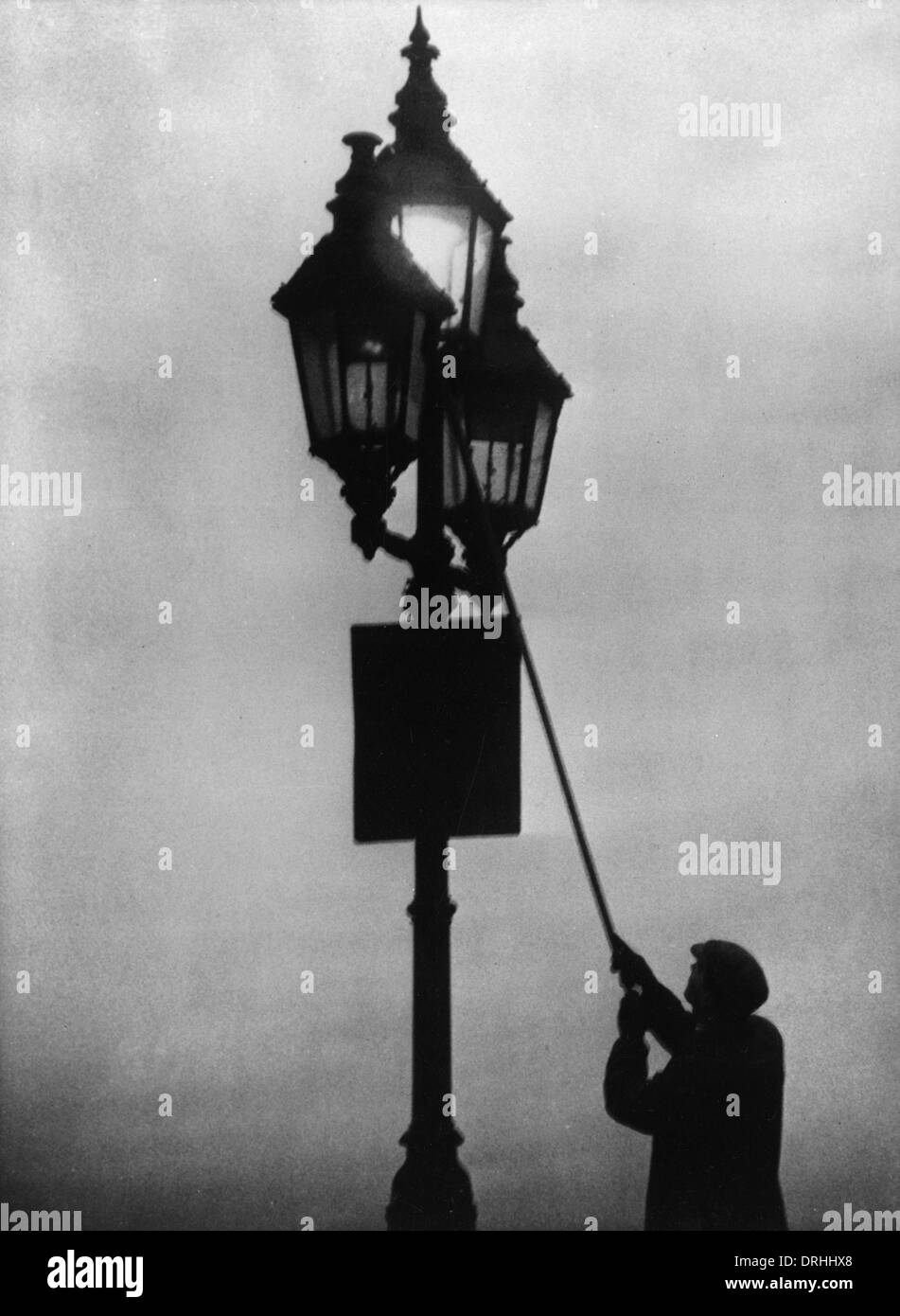 Old fashioned lamplighter hi-res stock photography and images - Alamy
