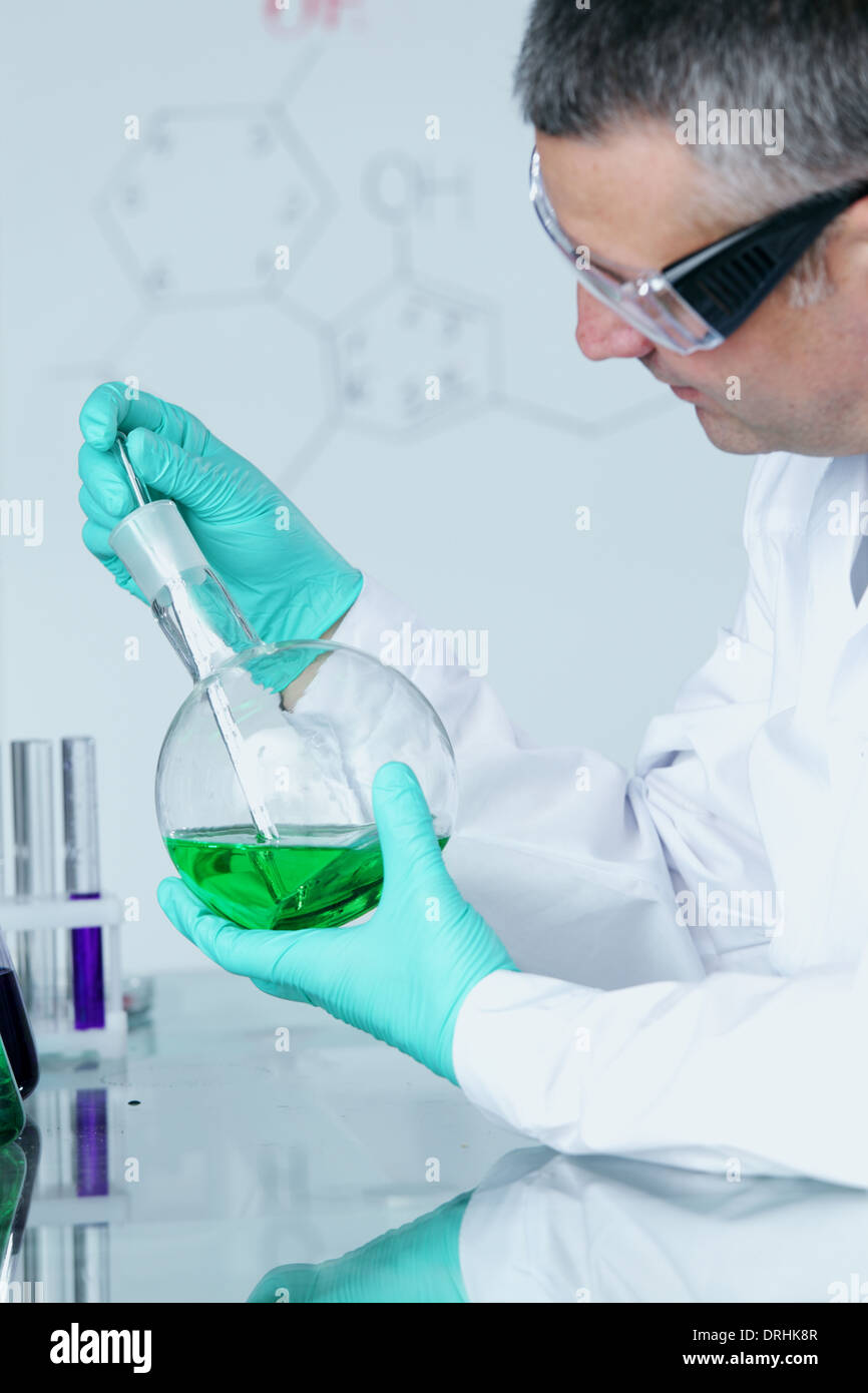 Chemistry Scientist conducting experiments in laboratory Stock Photo ...