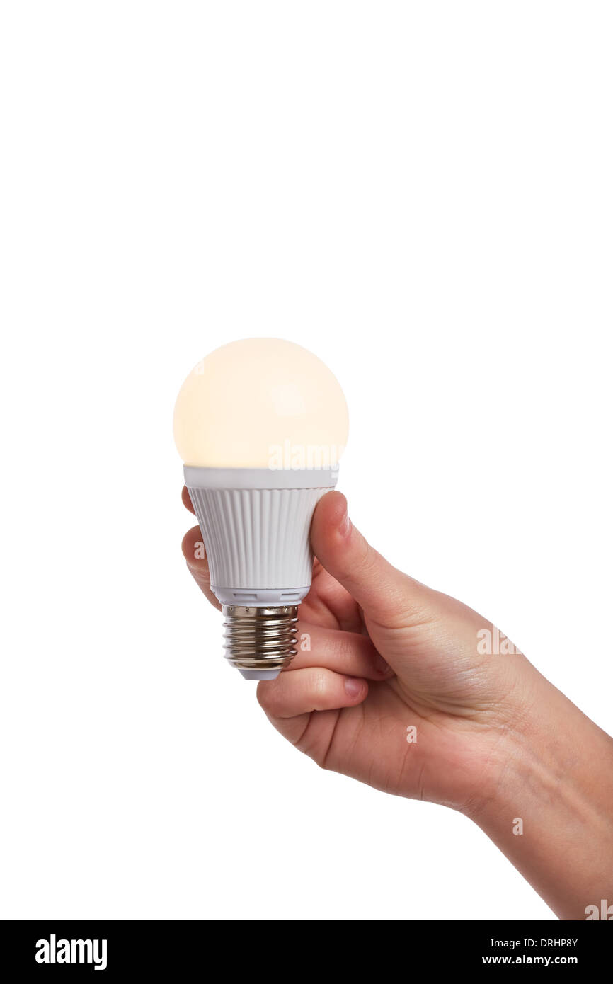 Hand holding bright led light bulb on white background Stock Photo - Alamy