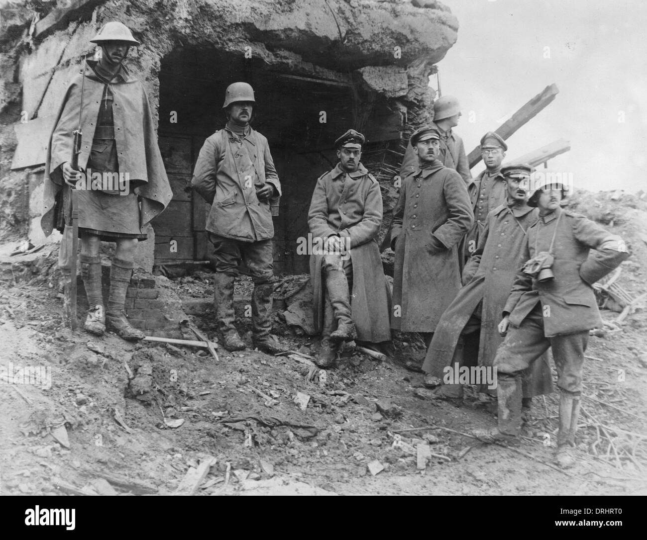 Captured German officers outside concrete bunker, WW1 Stock Photo ...
