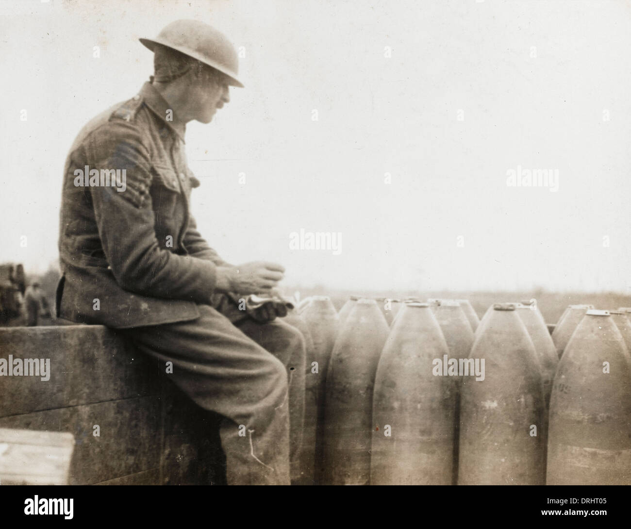 British corporal checking shell delivery, WW1 Stock Photo - Alamy