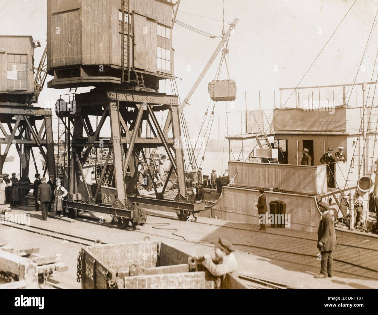 Loading up a boat at a supply depot in UK, WW1 Stock Photo - Alamy