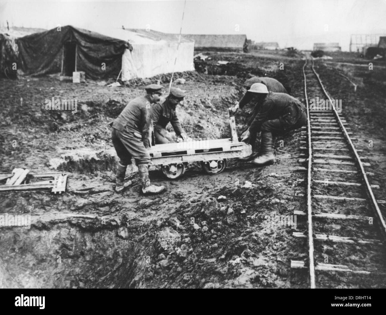 Men Working Near Railroad Tracks