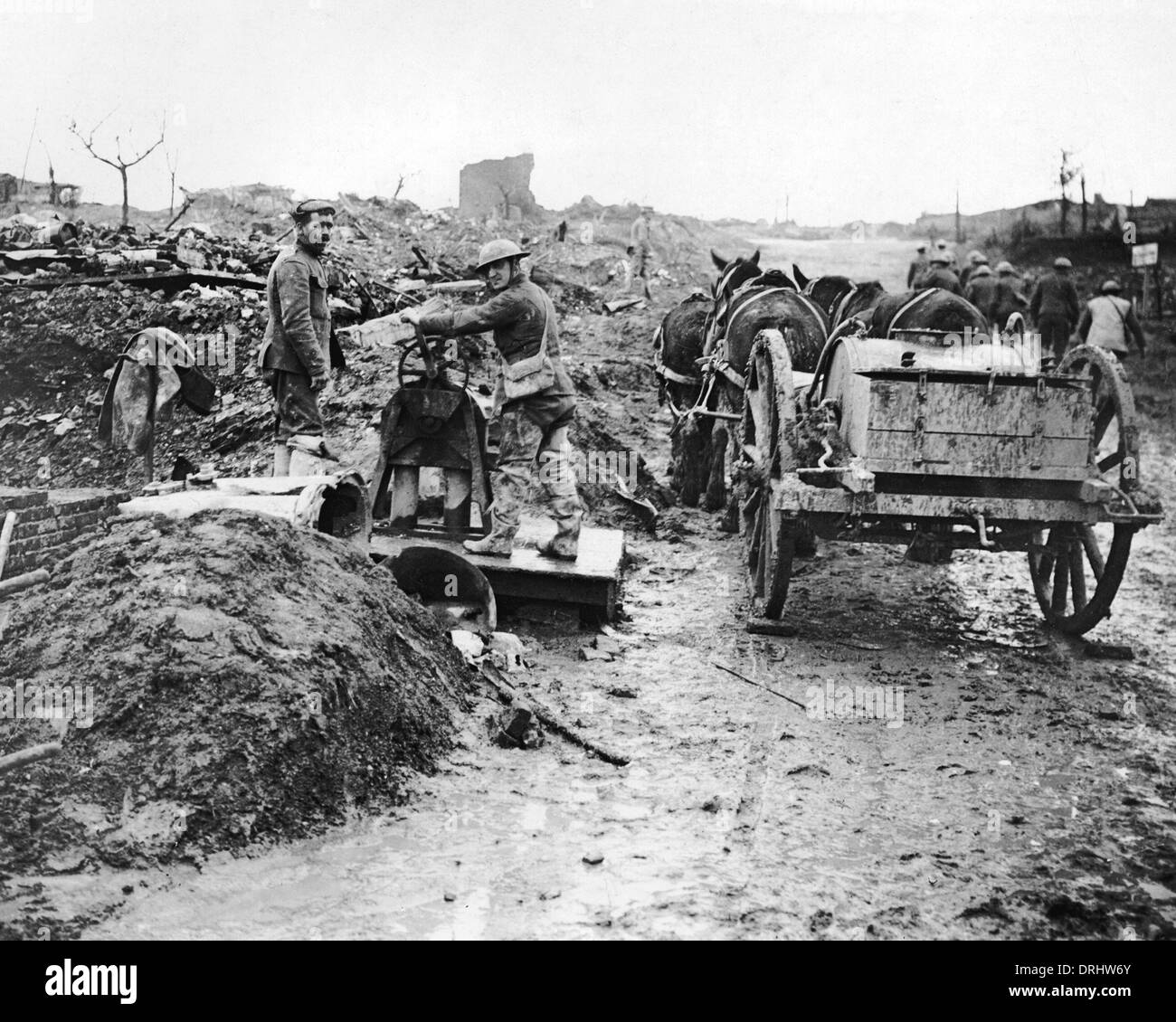 British soldiers drawing water in a captured village, WW1 Stock Photo ...