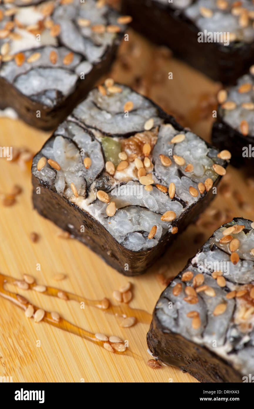 sesame sushi rolls Stock Photo - Alamy