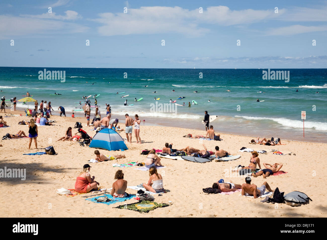 Manly Beach in Sydney,Australia, people relaxing and sunbathing on a ...