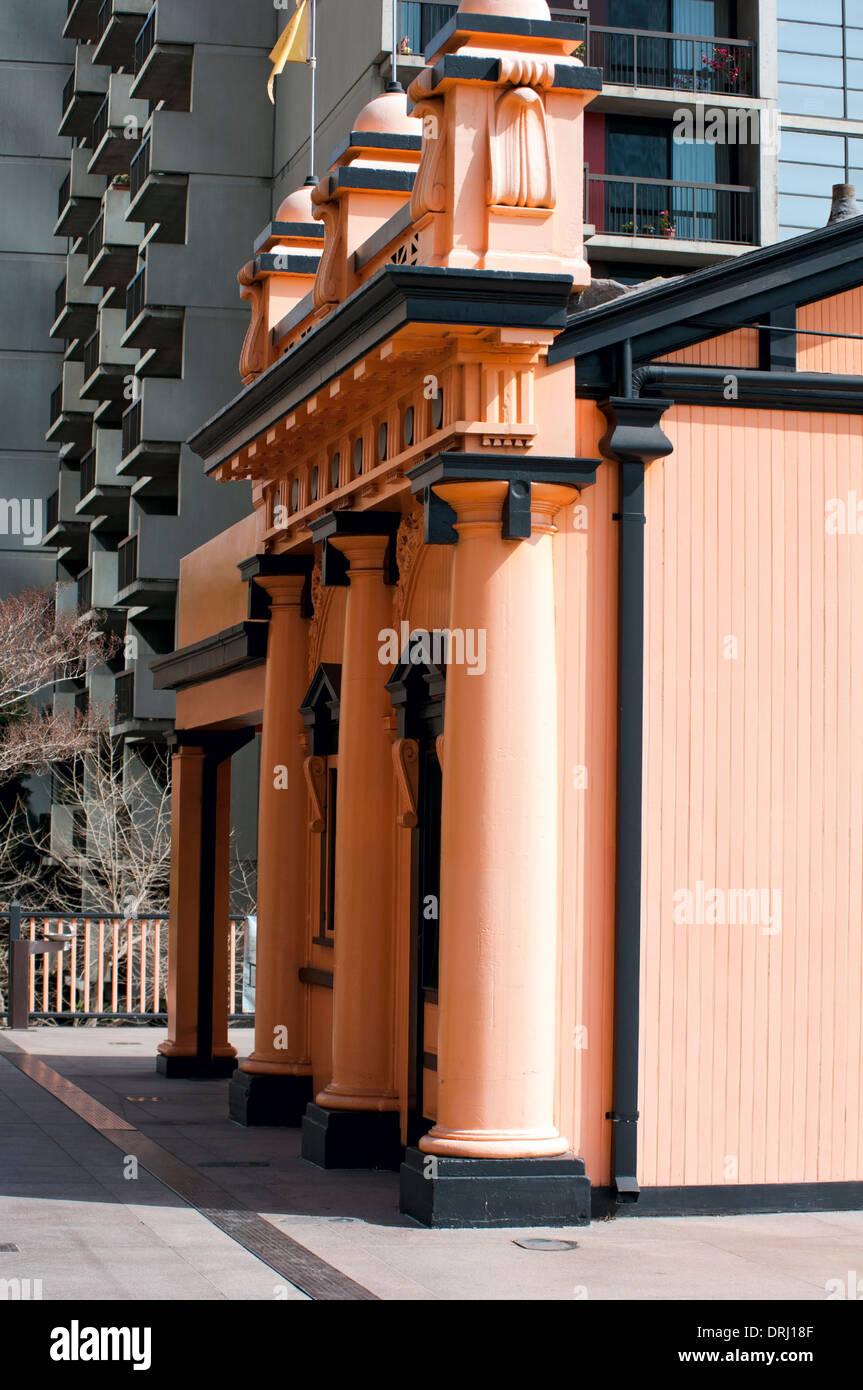vivid colors of victorian train station front and modern concrete high ...