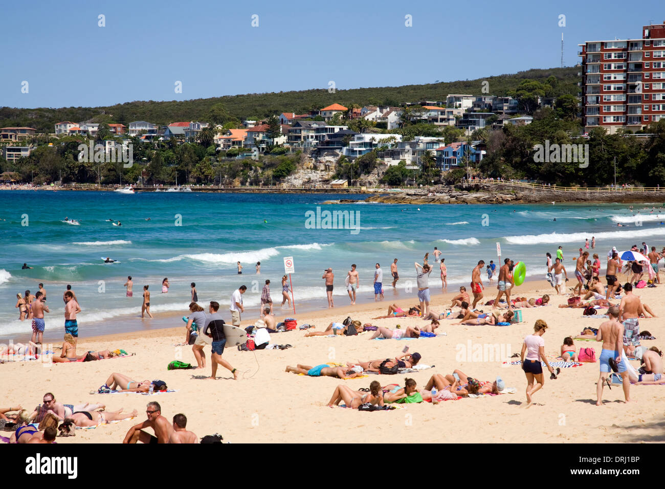 Manly Beach in Sydney,Australia, people relaxing and sunbathing on a ...