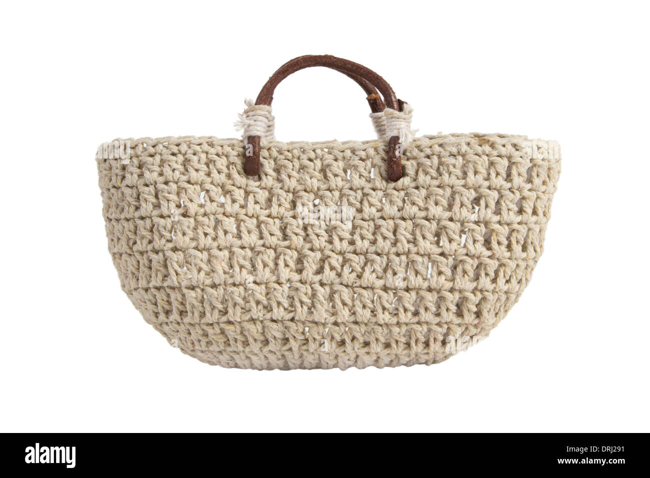 Braided fabric handbag with wooden handles isolated on white background ...
