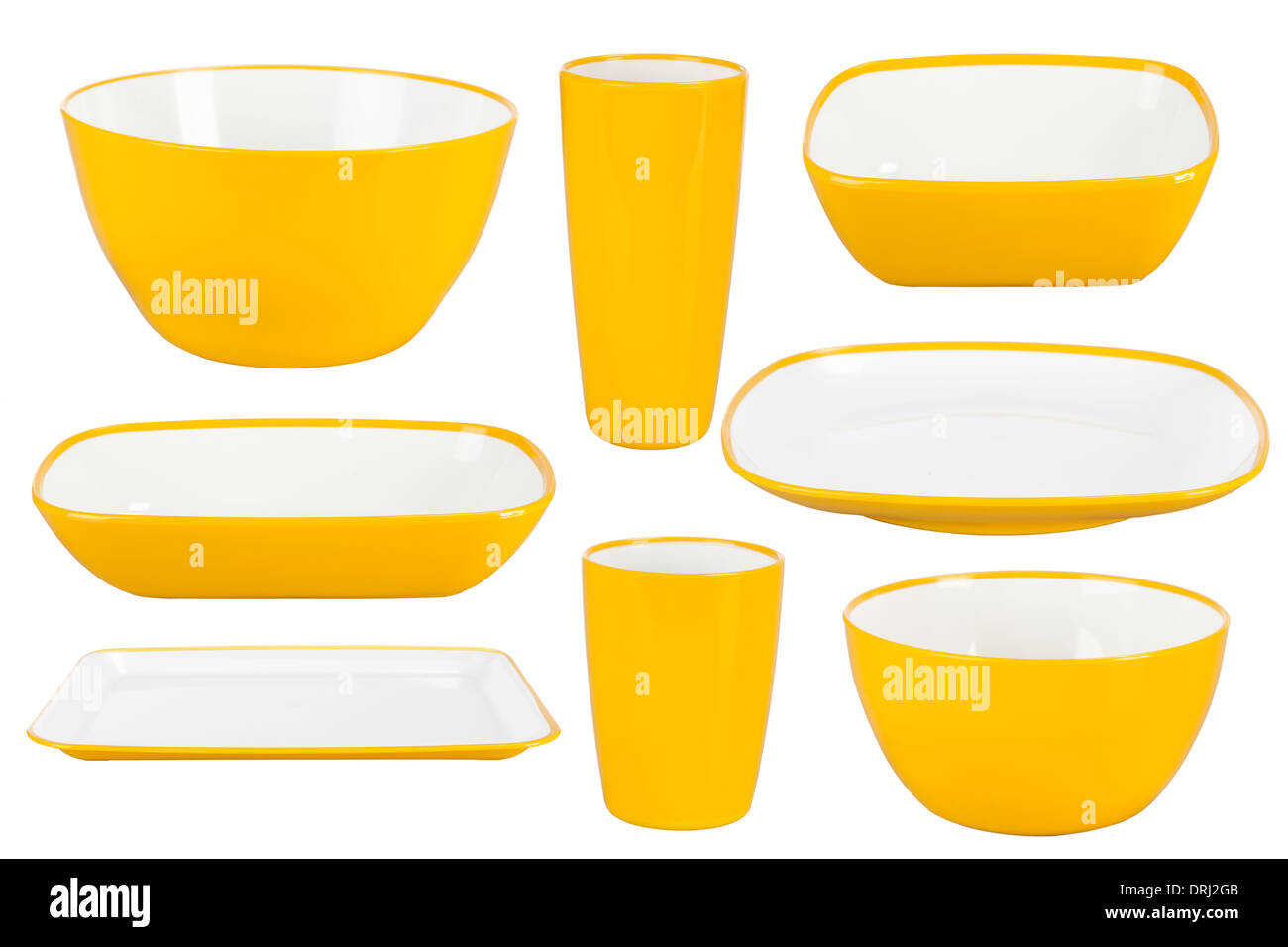 Yellow plastic tableware isolated on white background Stock Photo - Alamy