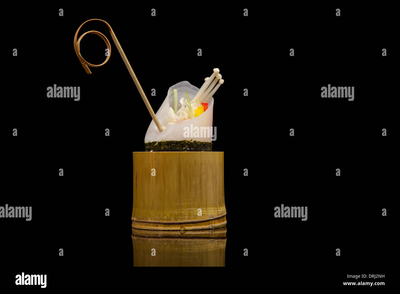 japanese food in bamboo pot on black background Stock Photo - Alamy