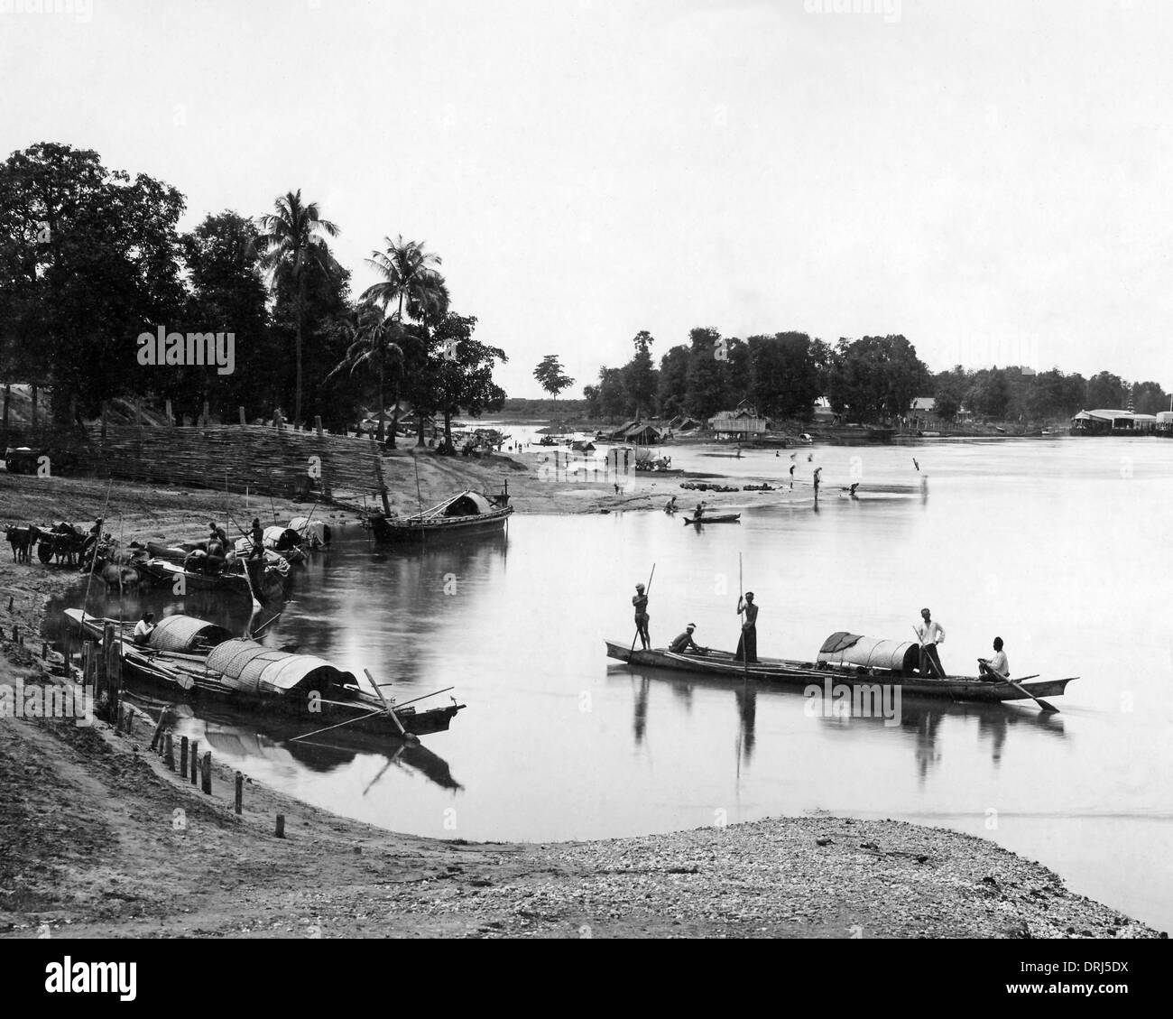 Boats on a river, India Stock Photo - Alamy