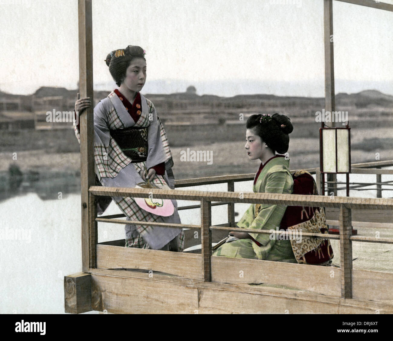 Two geishas on a balcony, Japan Stock Photo - Alamy