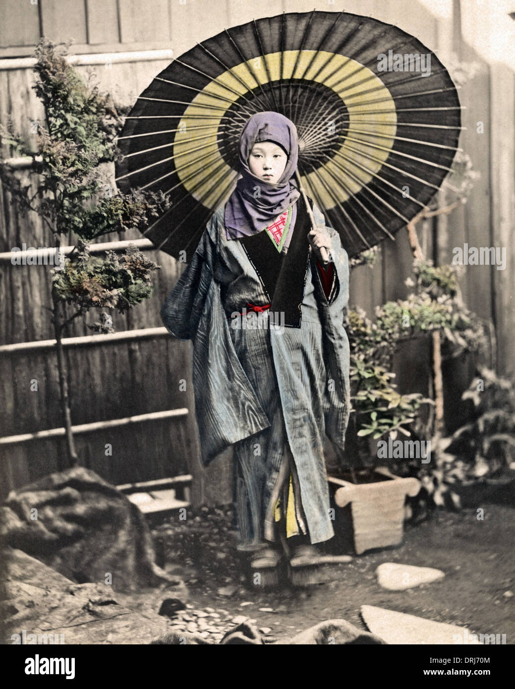Young woman in winter clothing, Japan Stock Photo - Alamy