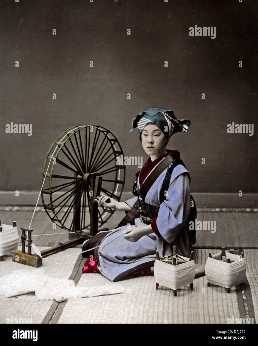 Young woman spinning thread, Japan Stock Photo - Alamy