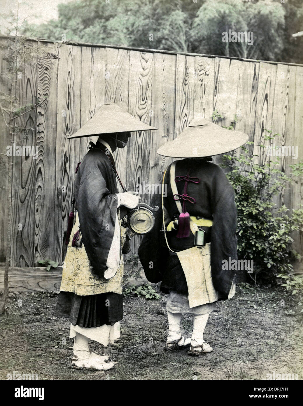 Pilgrims walking along a street, Japan Stock Photo - Alamy