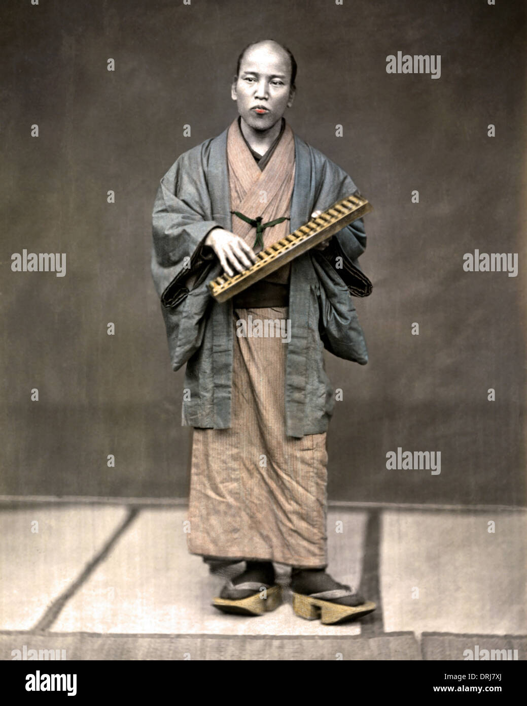 Man with abacus, Japan Stock Photo - Alamy