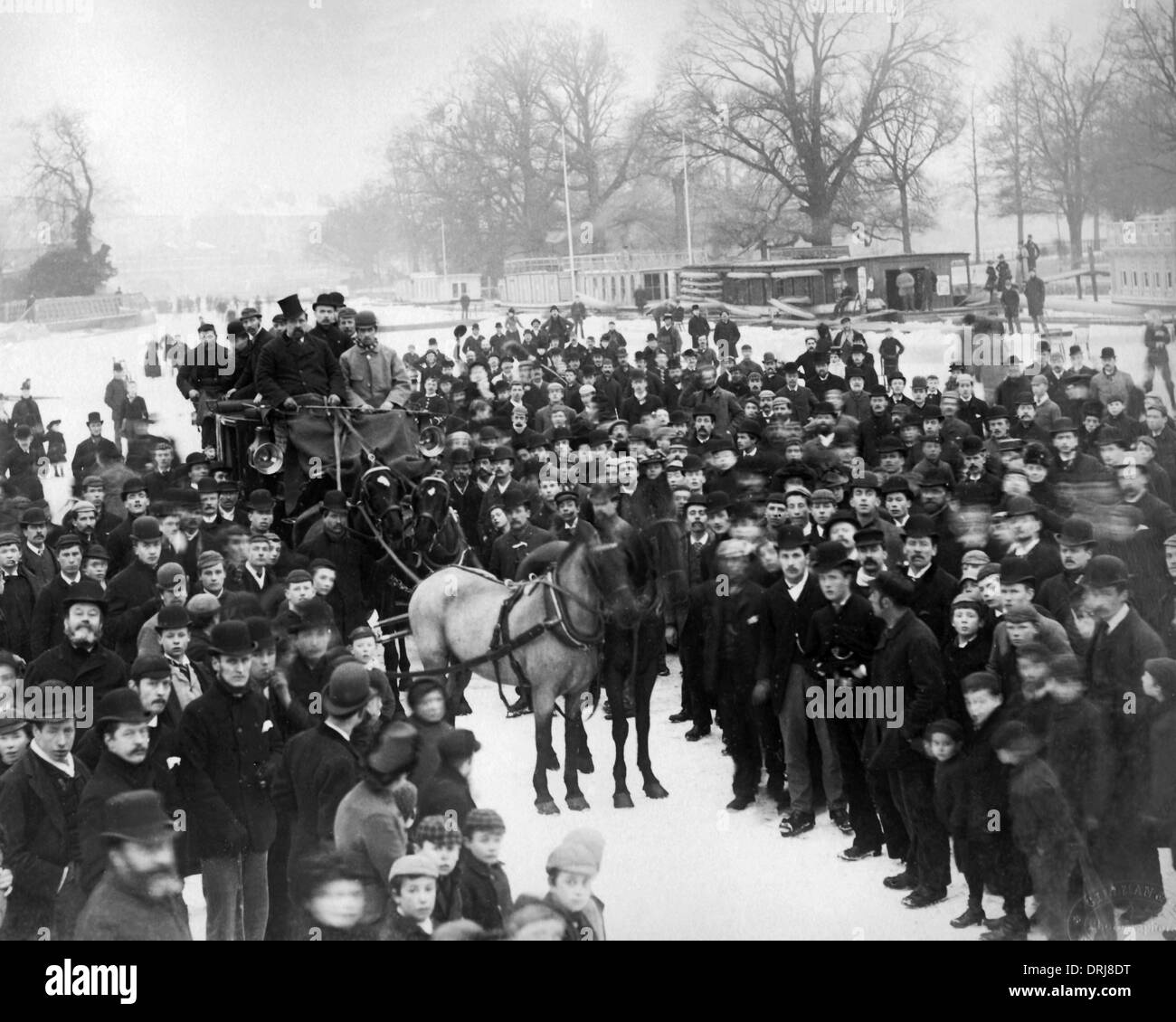 Horse-drawn carriage on frozen river Stock Photo - Alamy
