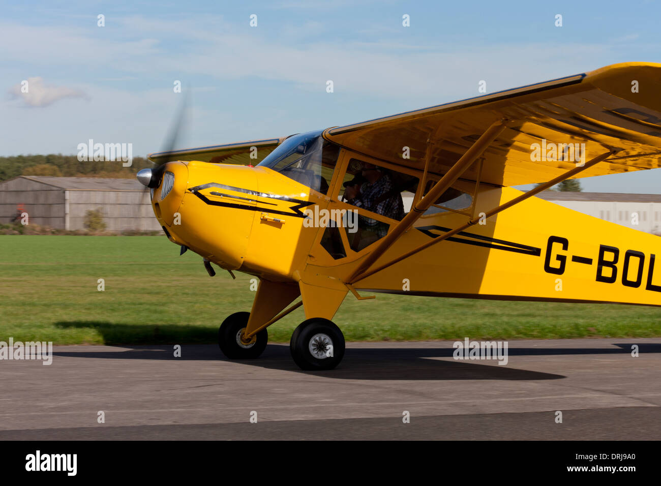 Taylorcraft BC12-65 G-BOLB taxiing at Breighton Airfield Stock Photo ...