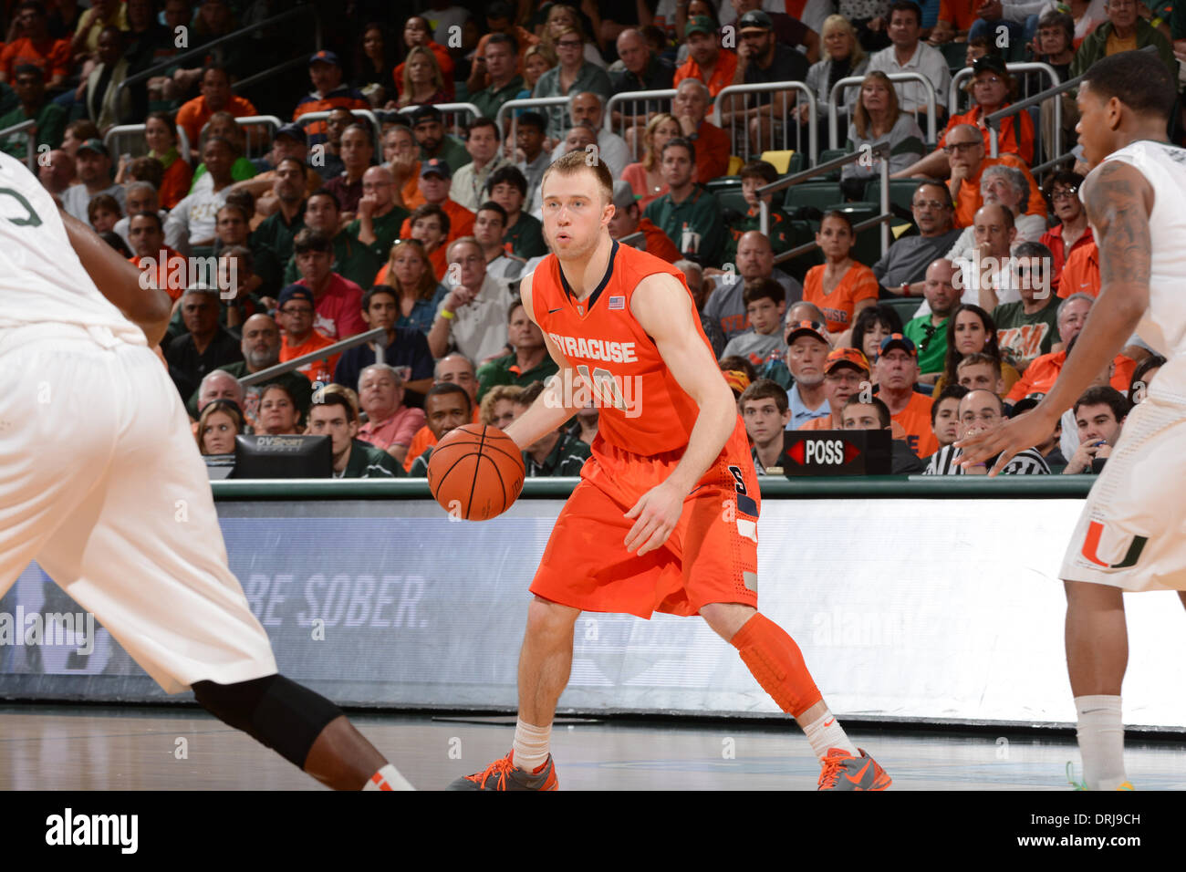Coral Gables, Florida, USA. 25th Jan, 2014. Trevor Cooney #10 of ...