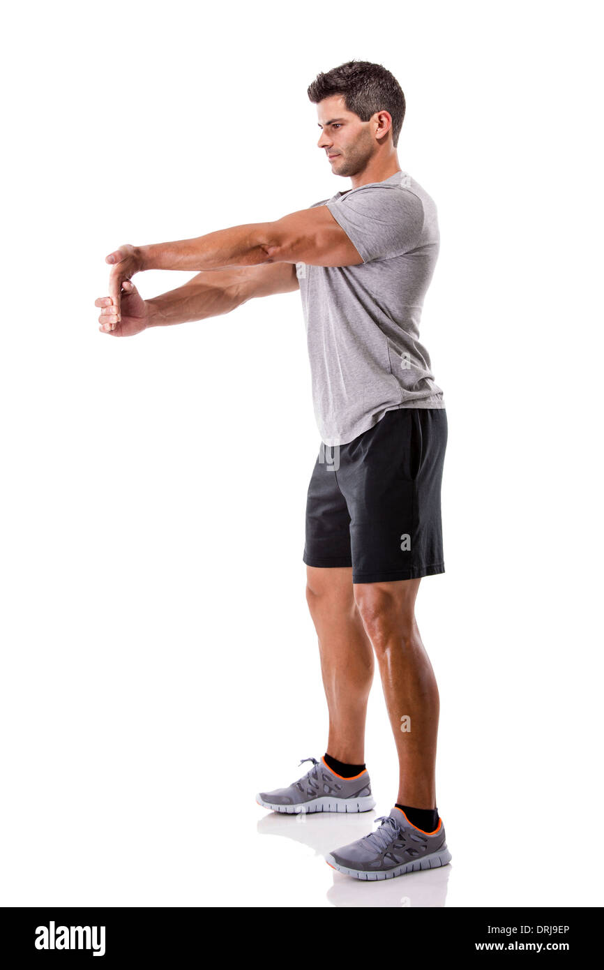 Athletic man stretching arms, isolated over a white background Stock ...