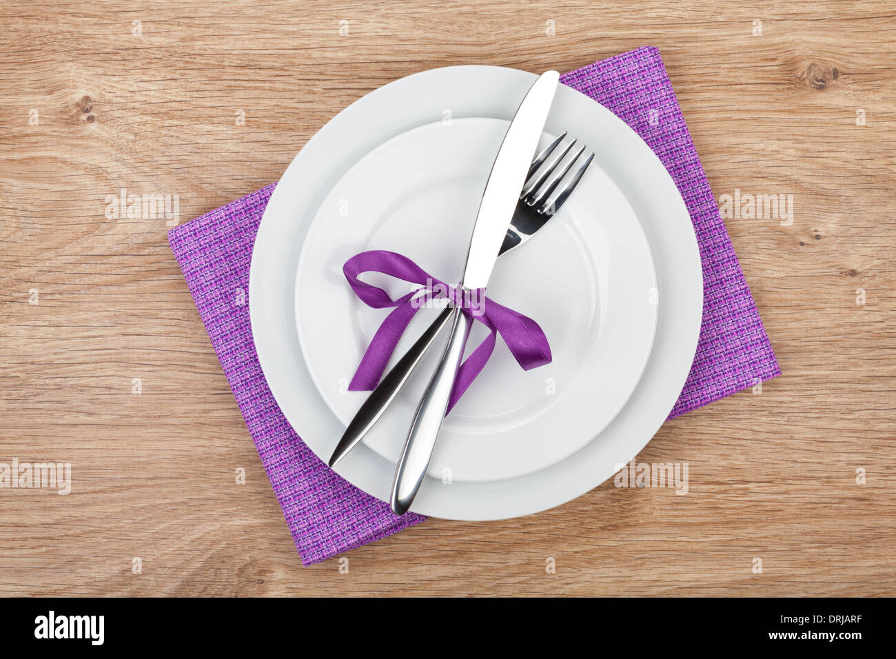 Fork knife over plates hi-res stock photography and images - Alamy