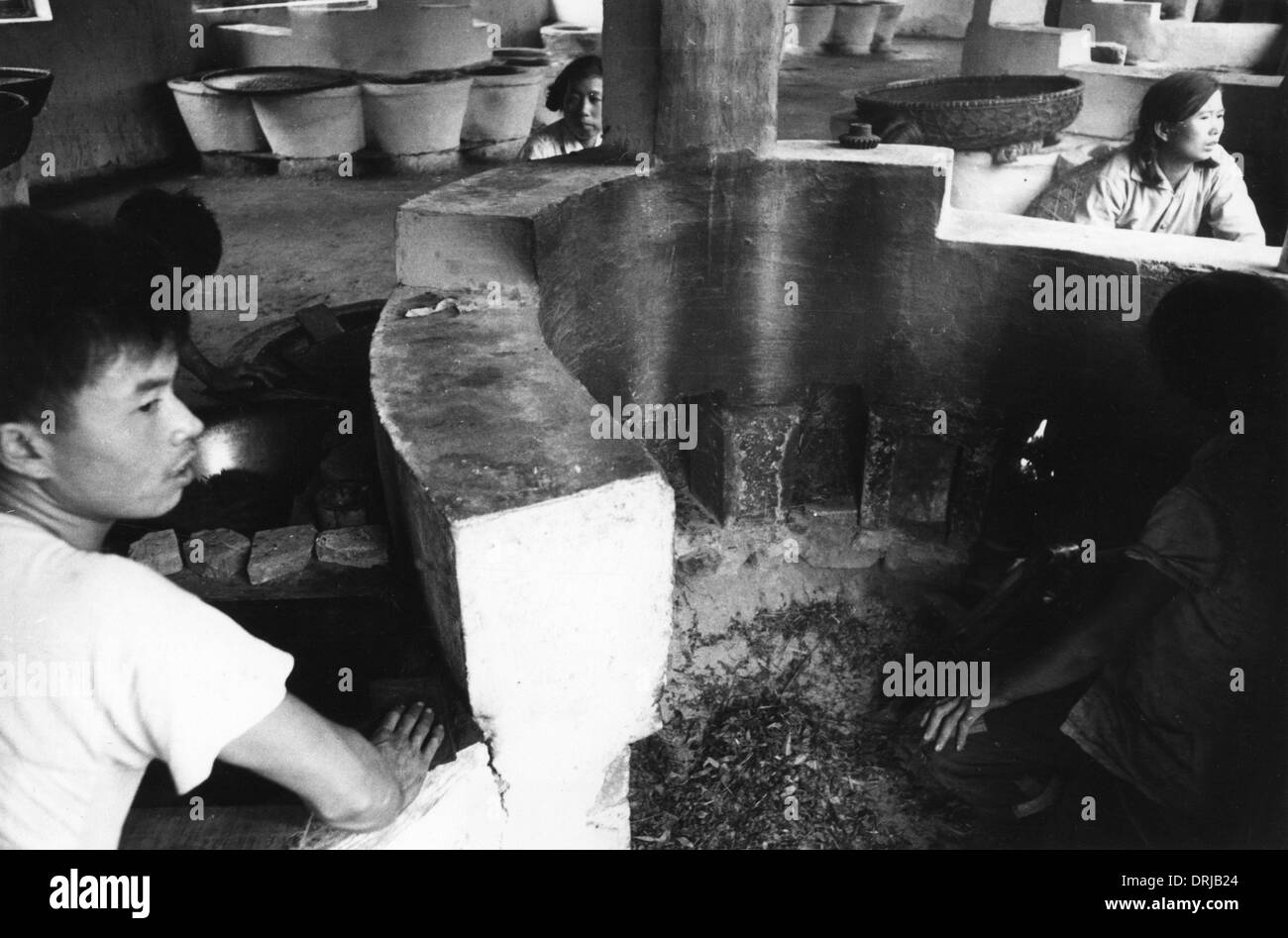 Drying tea leaves, Hangchow (Hangzhou), China Stock Photo - Alamy