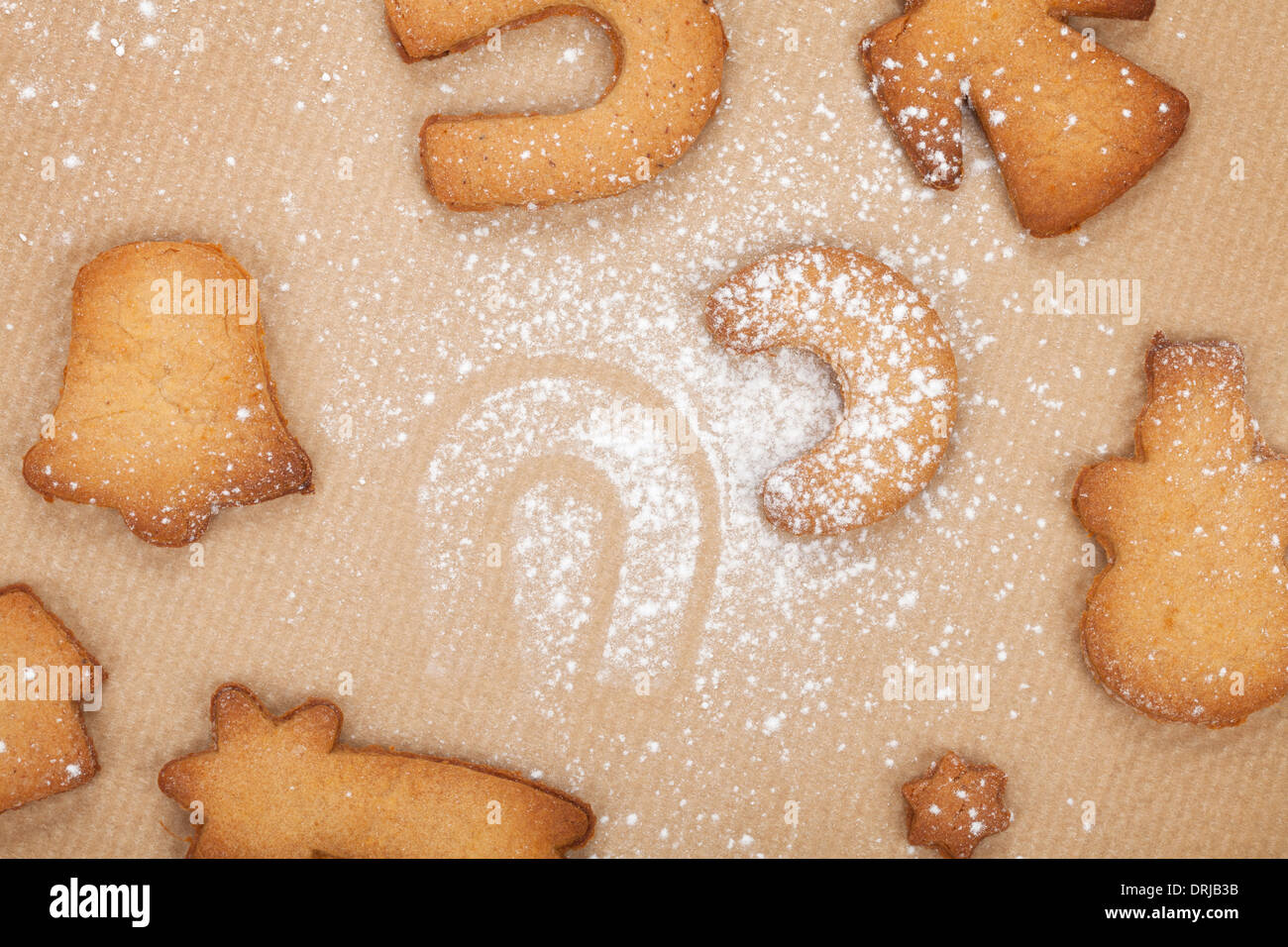 Various gingerbread cookies on cooking paper background Stock Photo - Alamy