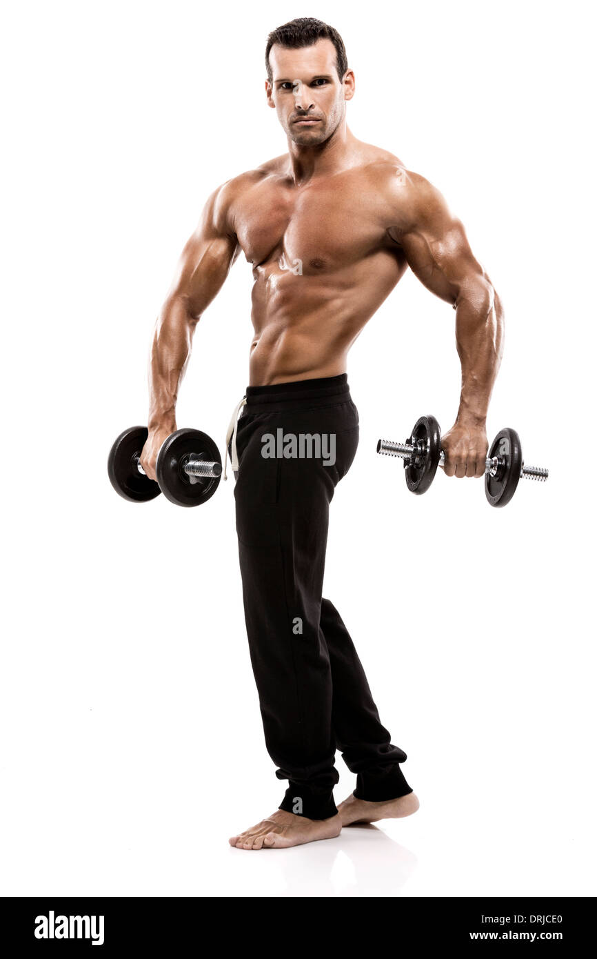 Muscle man in studio lifting weights, isolated over a white background ...