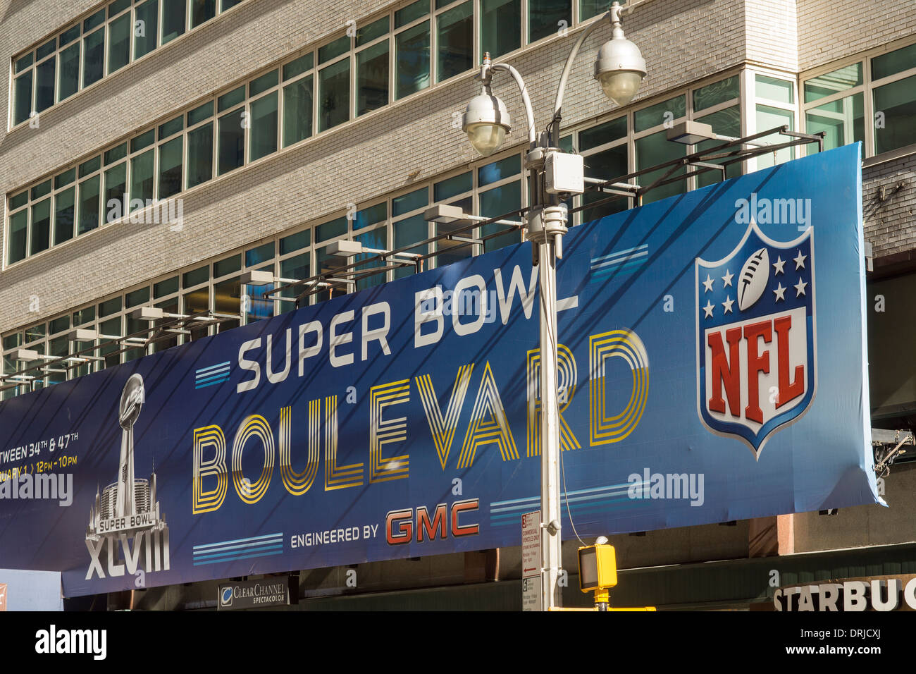 Super Bowl Boulevard is readied, with a surveillance camera seen on a ...