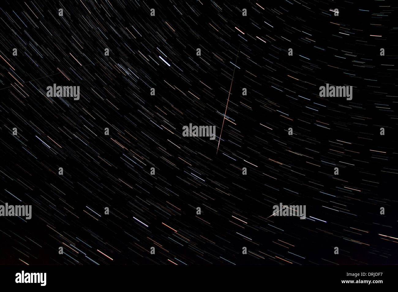 Star trails and falling perseid in the sky Stock Photo - Alamy