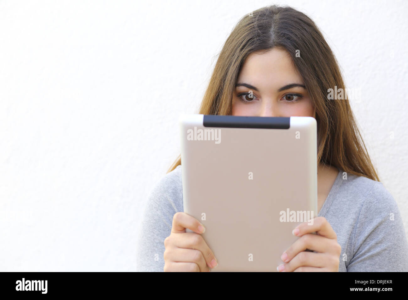 Teen girl reading tablet hi-res stock photography and images - Alamy